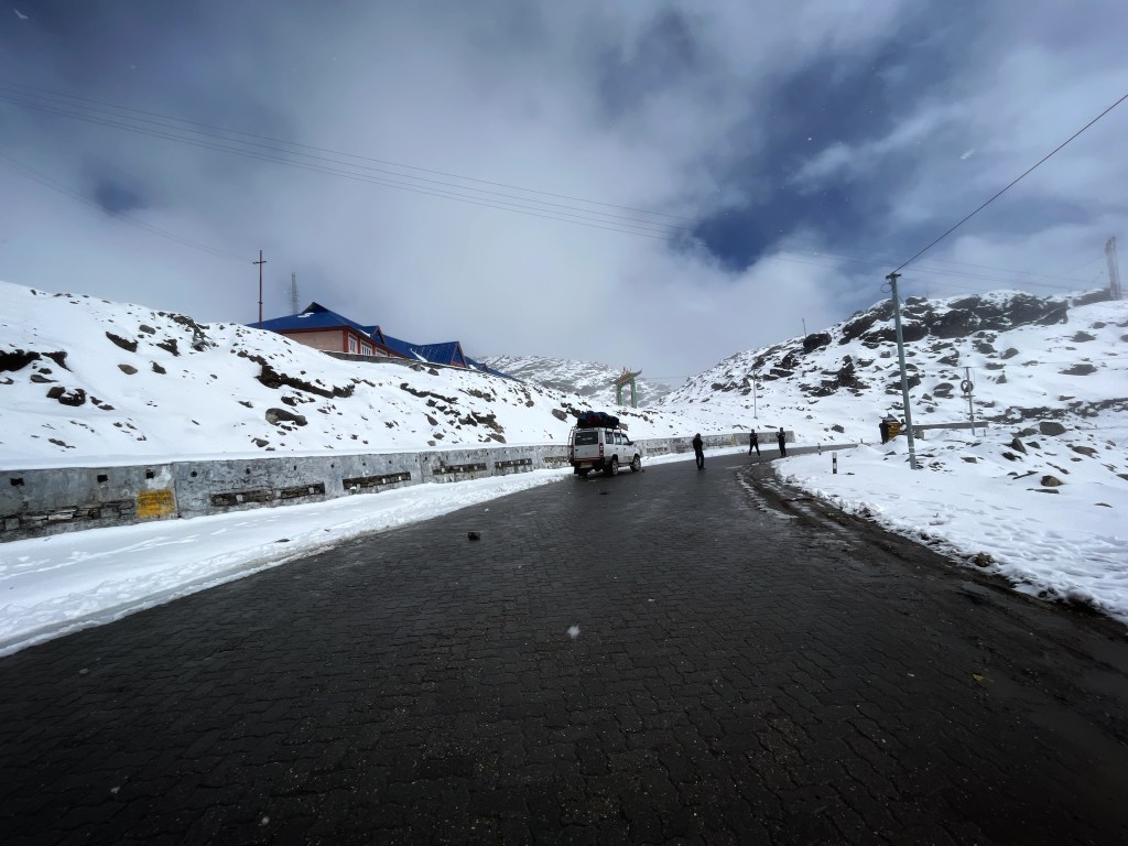 Braving through Bumla Pass at 15200 ft & minus 10 degrees celsius in ...